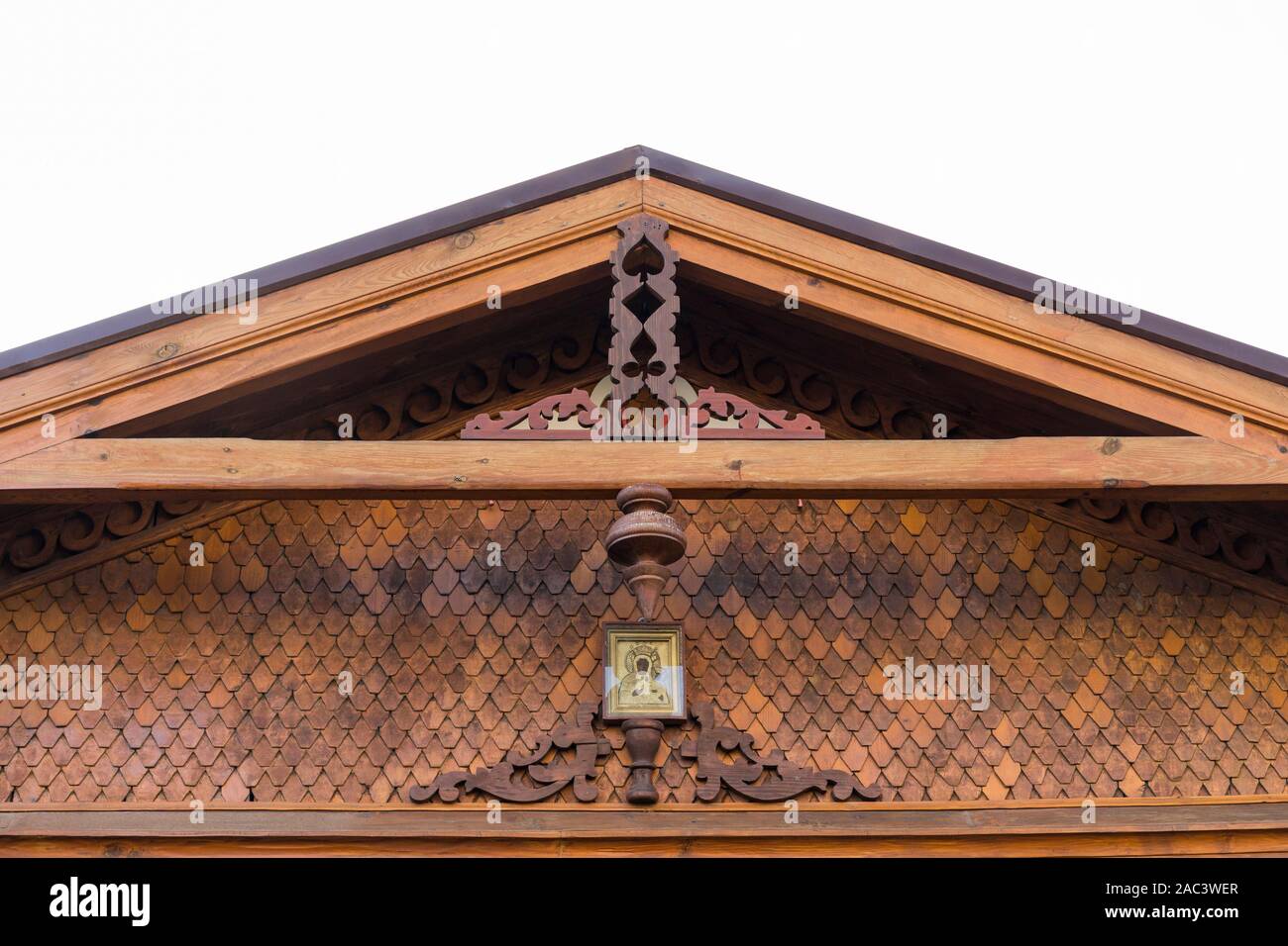old wooden pediment with Holy Mary picture Stock Photo - Alamy