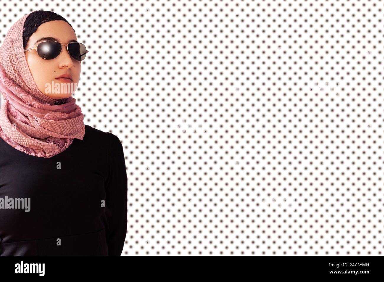 Stylish Muslim woman in traditional Islamic clothing. Portrait of ...