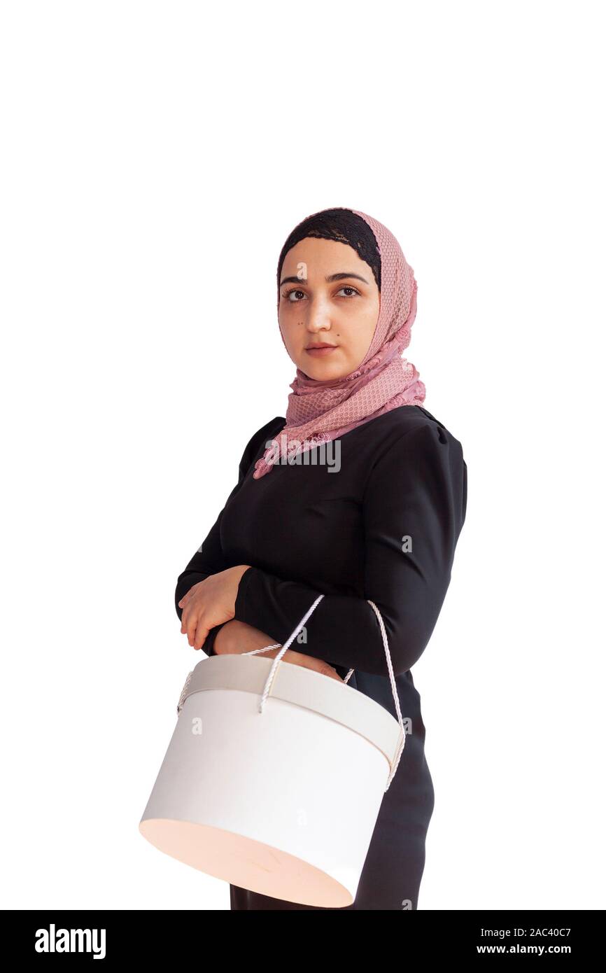 Muslim girl receiving a big present. Iranian woman holding a gift box ...