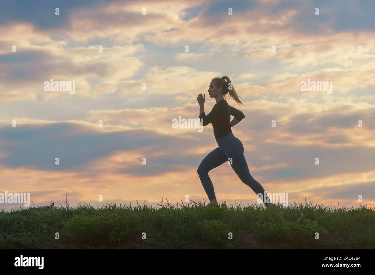 Running woman morning workout. Female Runner. Jogging during sunrise ...