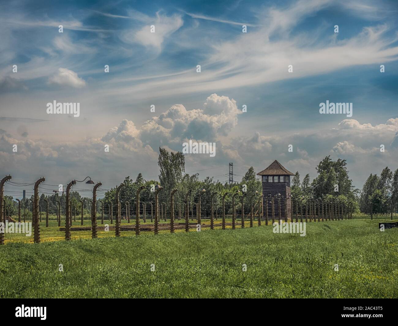 Oświęcim, Poland - June 05, 2019: Electric fence with barbed wire and ...