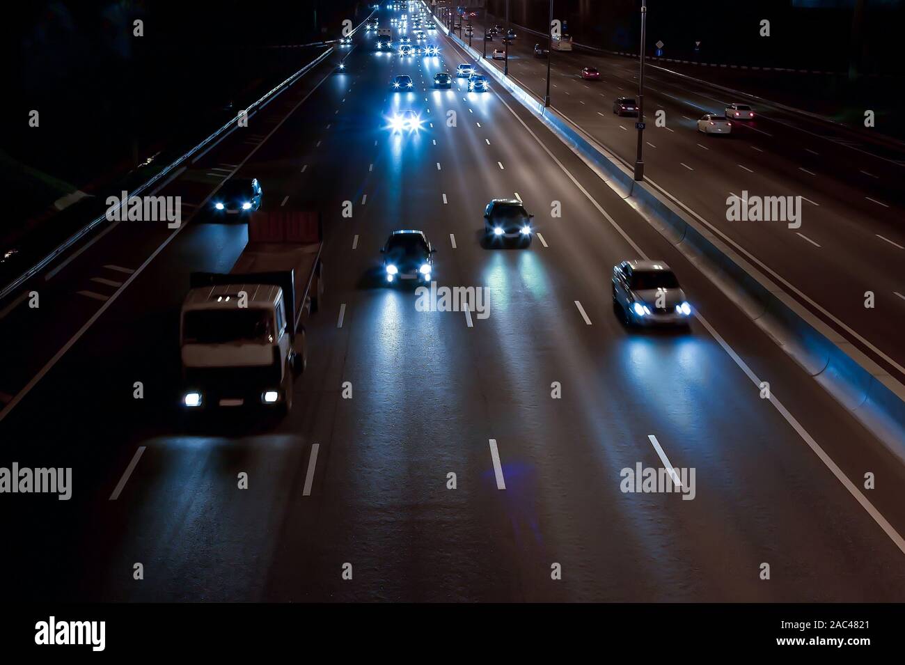 cars move on the night highway Stock Photo - Alamy