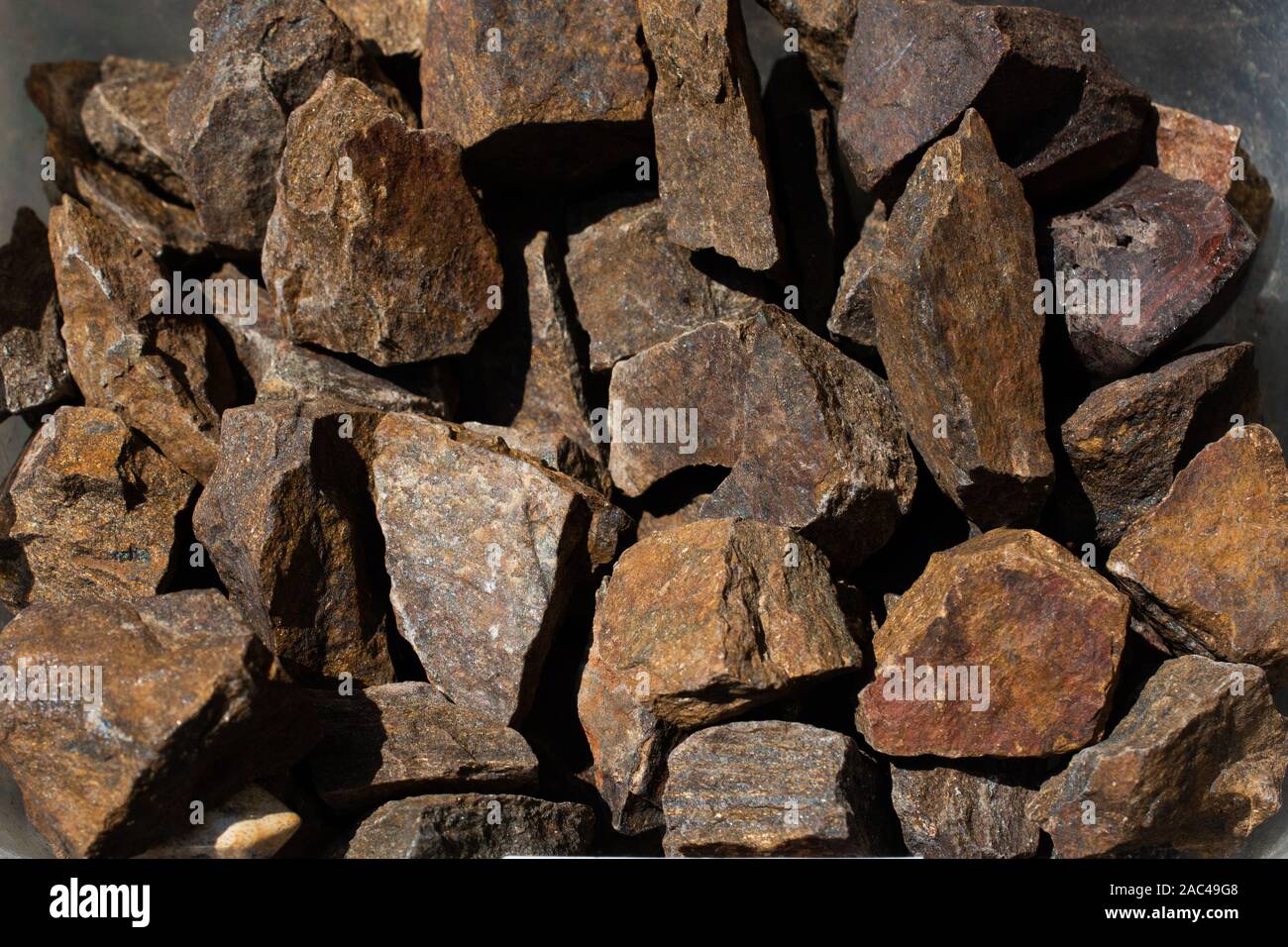 Bronzite gemstone as natural mineral rock specimen Stock Photo - Alamy