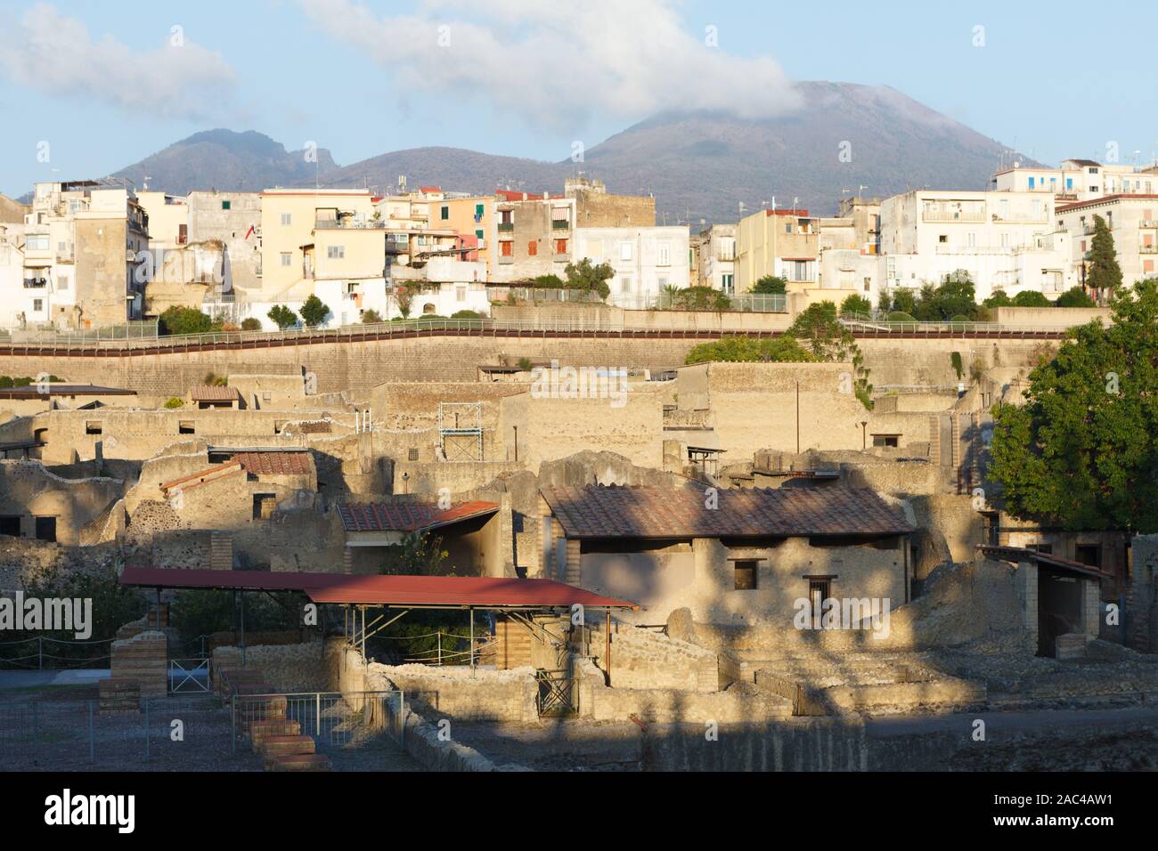 Ancient Ercolano (Herculaneum) city ruins with modern Ercolano and ...