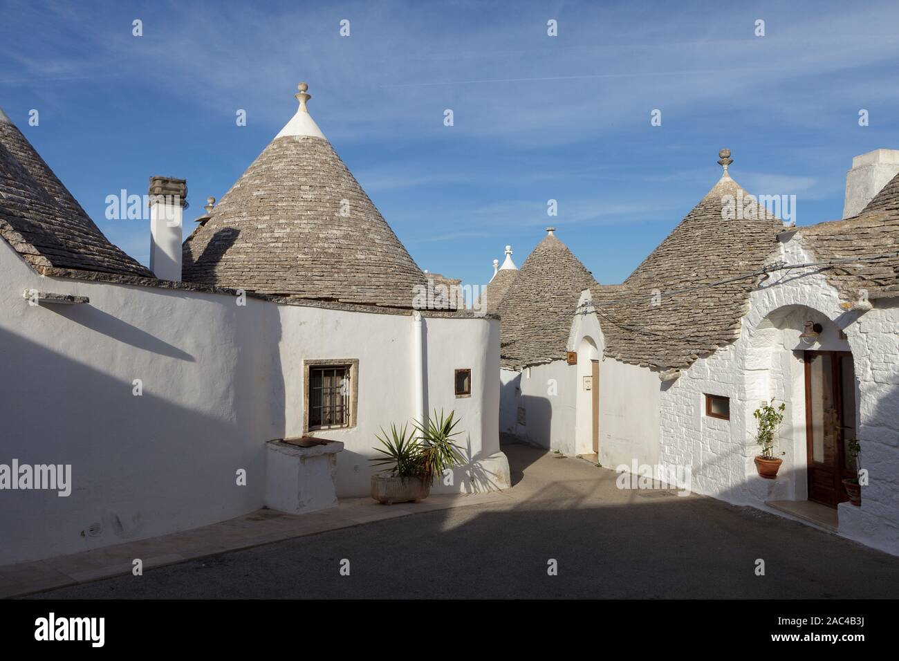 Alberobello, street with trulli (trullo) houses. Italy Stock Photo - Alamy