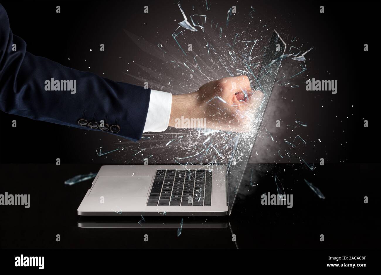 Strong arm boxing laptop screen strongly Stock Photo - Alamy