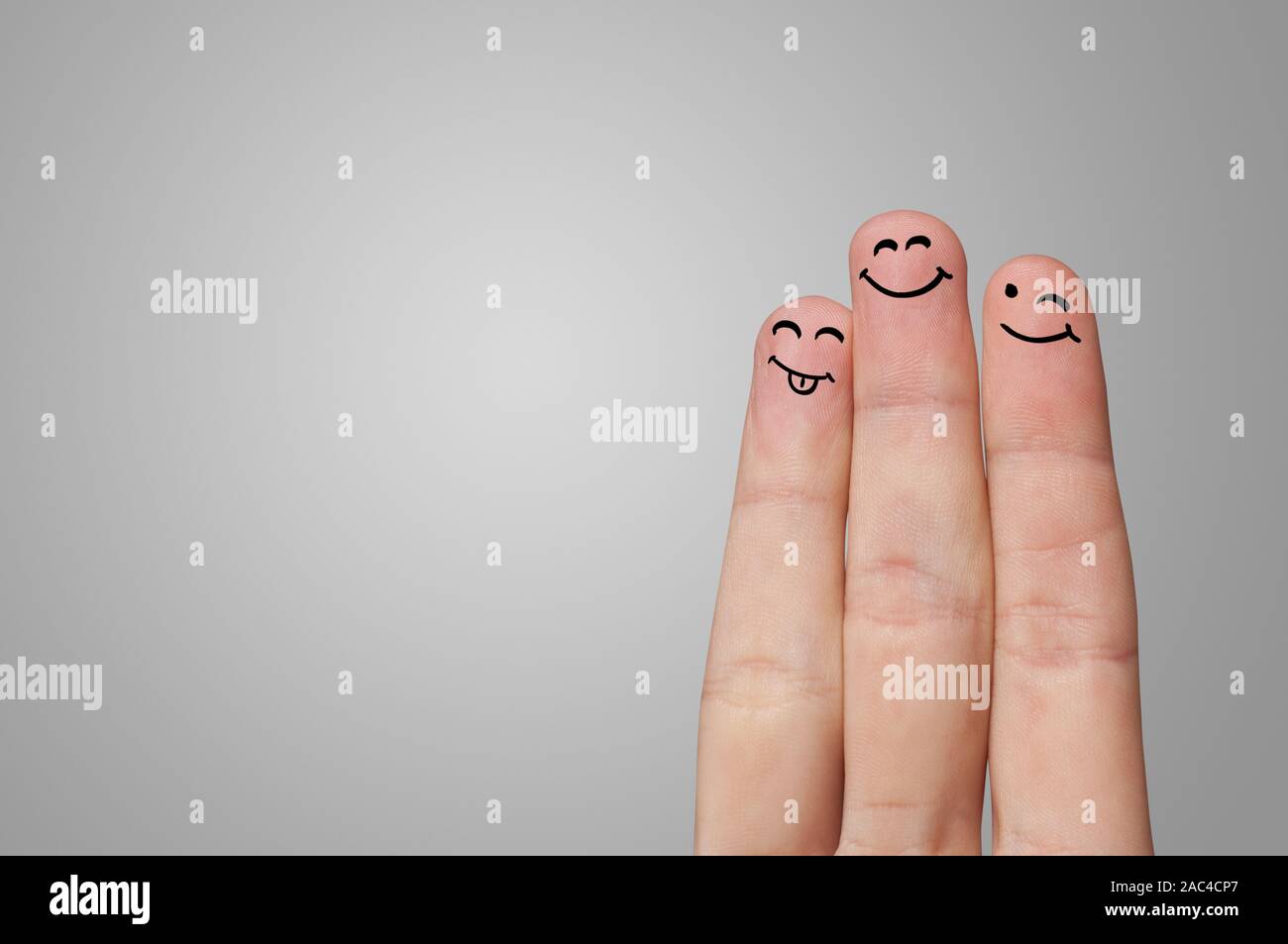 Happy face fingers hugs each other Stock Photo - Alamy