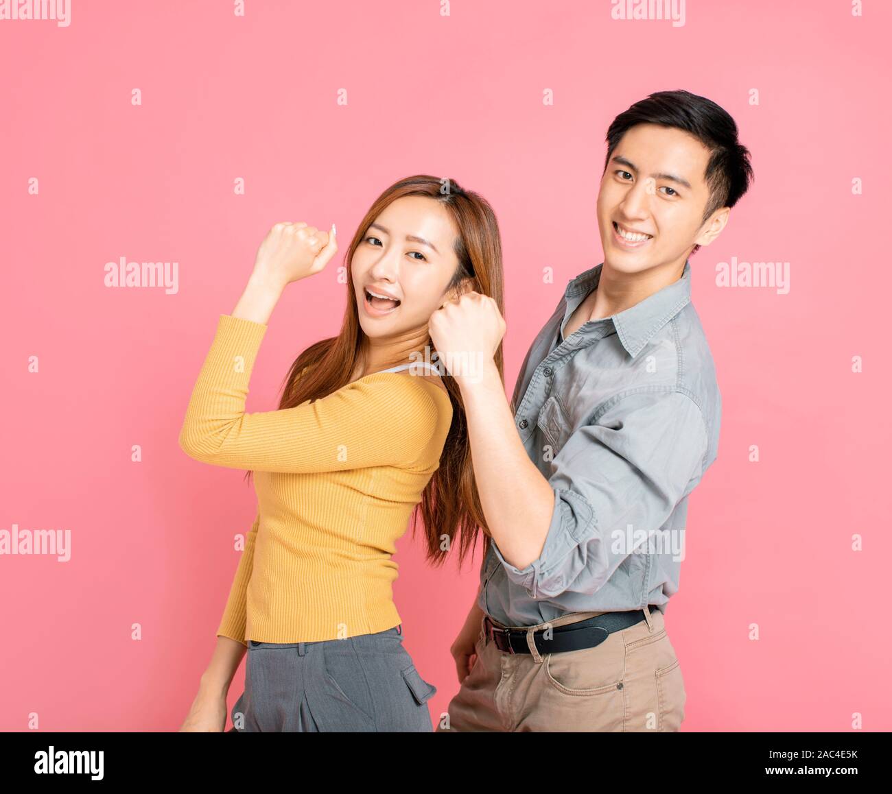 Portrait Of Happy Young Couple dancing Stock Photo - Alamy
