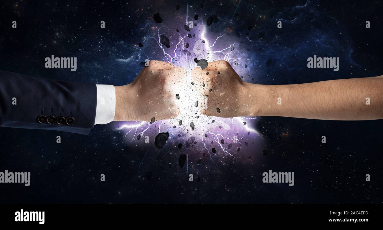 Two hands fighting with storm explosion concept Stock Photo - Alamy