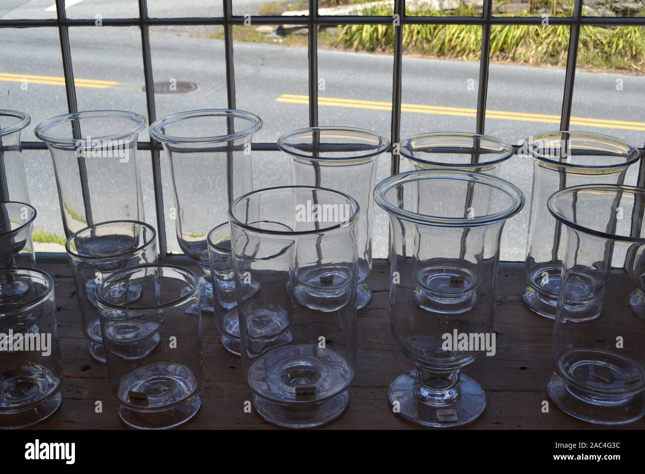 Glassware in window of New England shop Stock Photo - Alamy