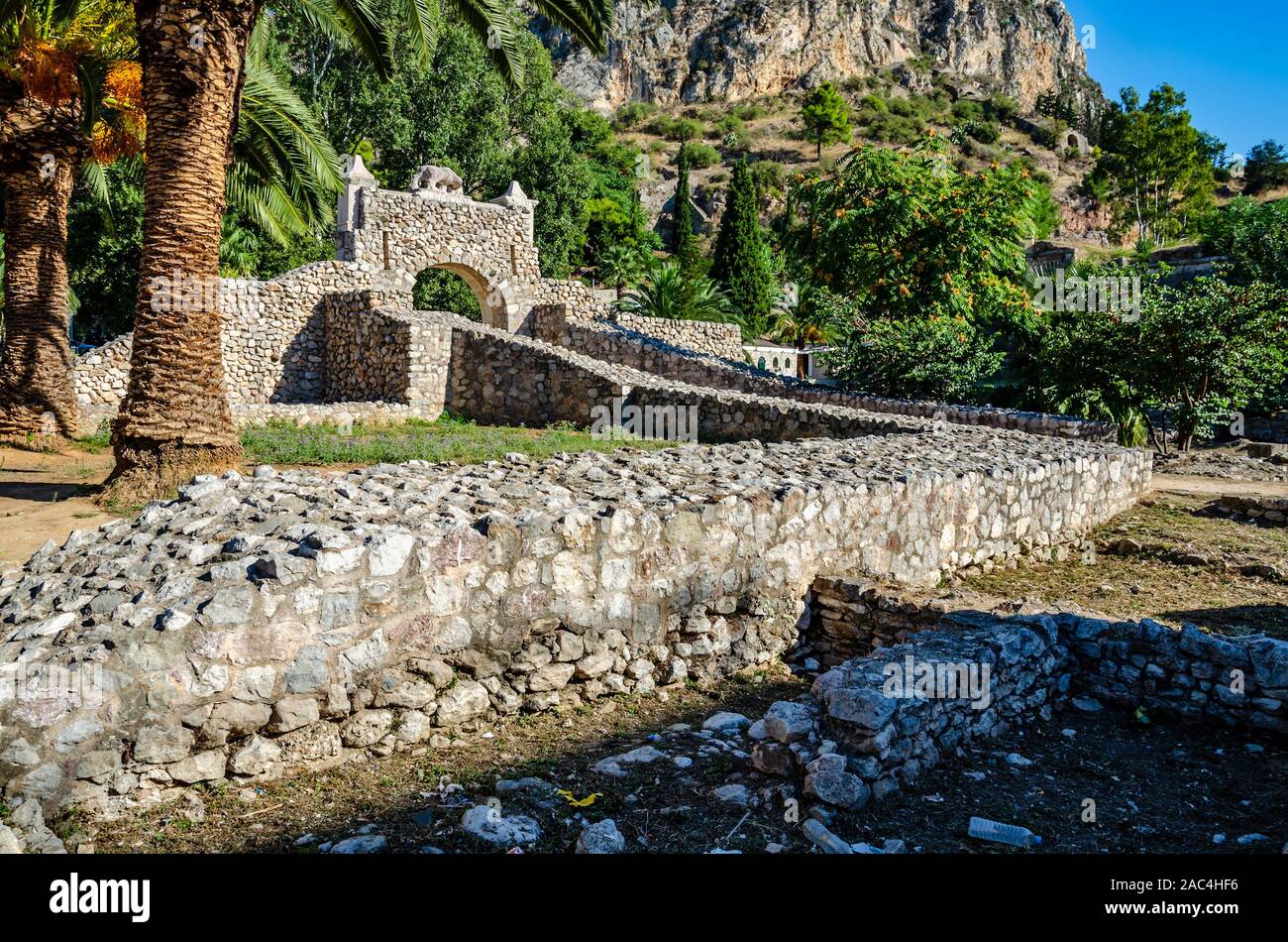 Ancient ruins in the center of Nafplio city, Greece against a deep blue ...