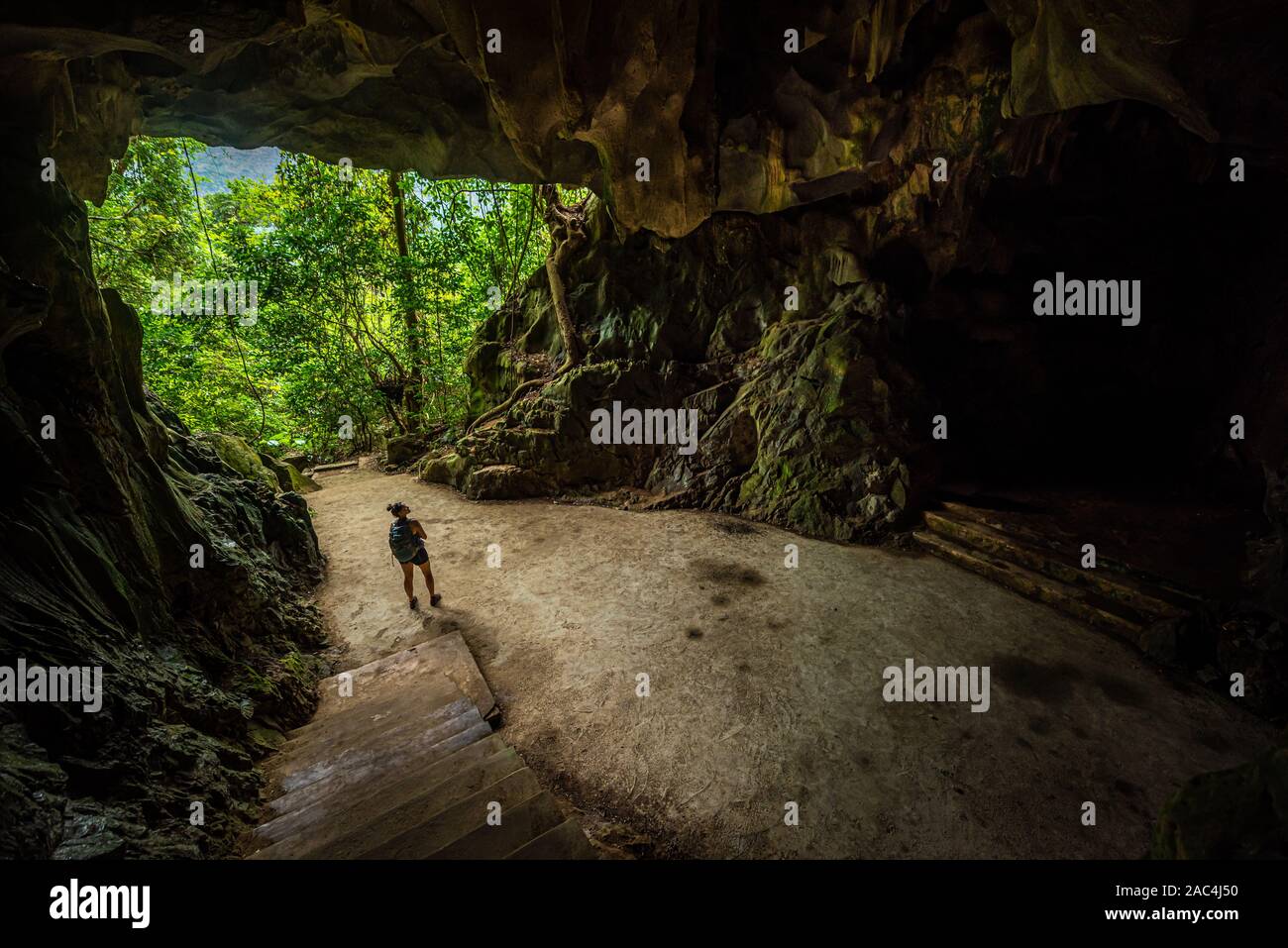 Dong Trung Trang Cave Vietnam Tourist backpacker exploring inside of a ...