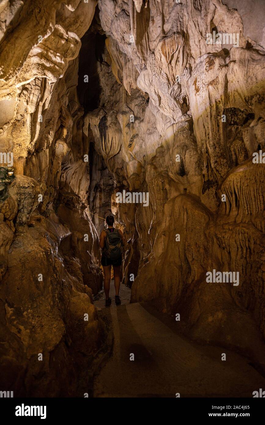 Dong Trung Trang Cave Vietnam Tourist backpacker exploring inside of a ...