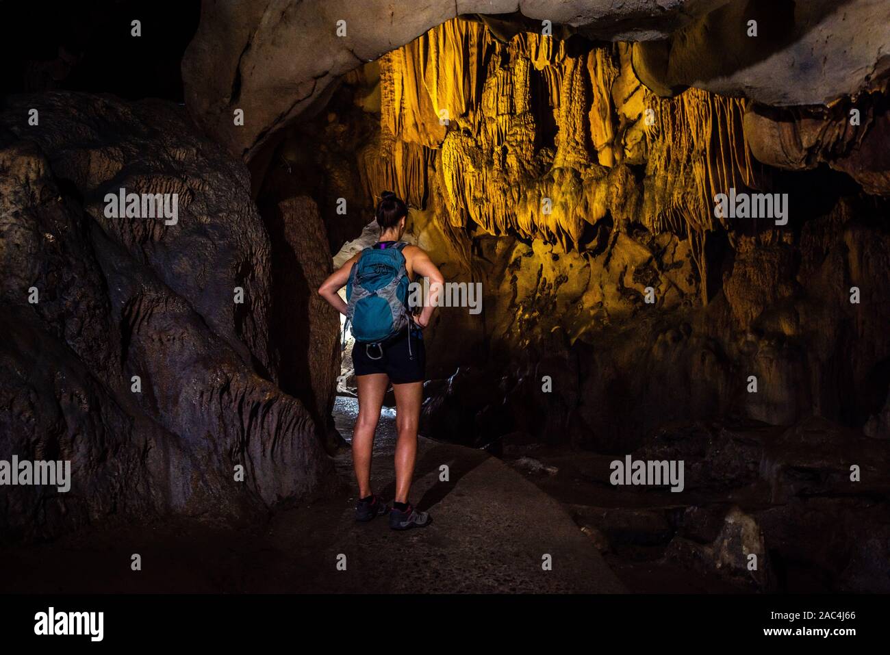 Dong Trung Trang Cave Vietnam Tourist backpacker exploring inside of a ...