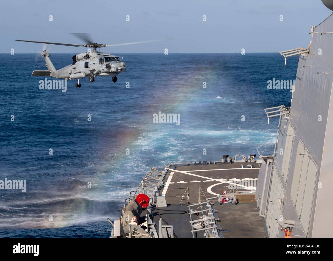 PACIFIC OCEAN (Nov. 26, 2019) An MH-60R Sea Hawk, assigned to the “Wolf ...