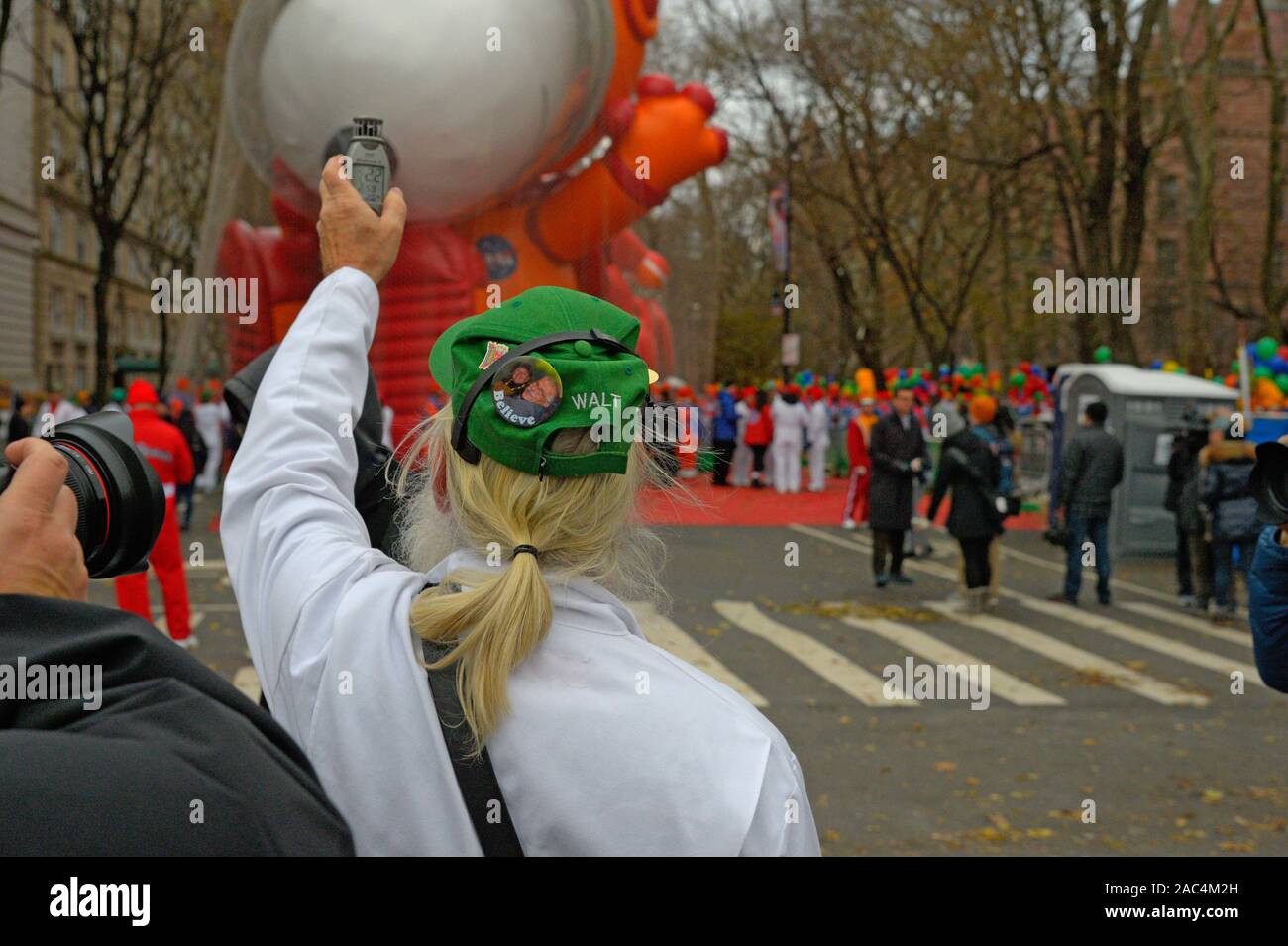 NEW YORK, NY - NOVEMBER 28: A balloon handler measure wind speed at the ...