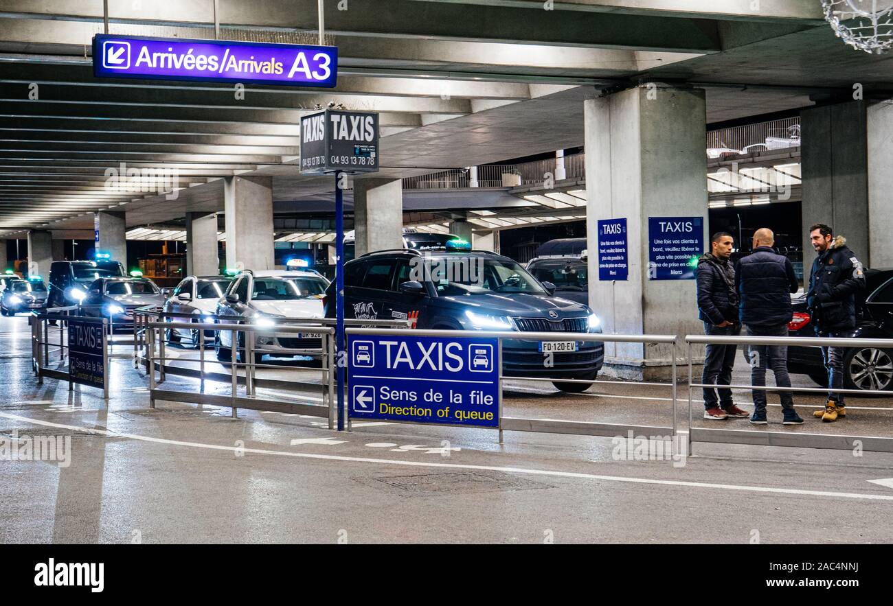 Nice, France - Nov 24, 2019: Row of cars taxis and their drivers ...