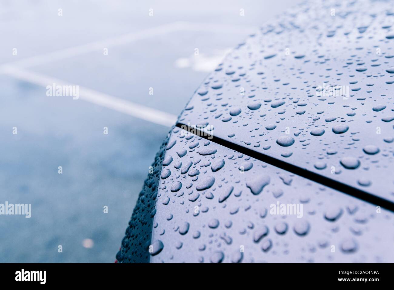 Multiple water drops on car new metallic paint - straight lines blue ...