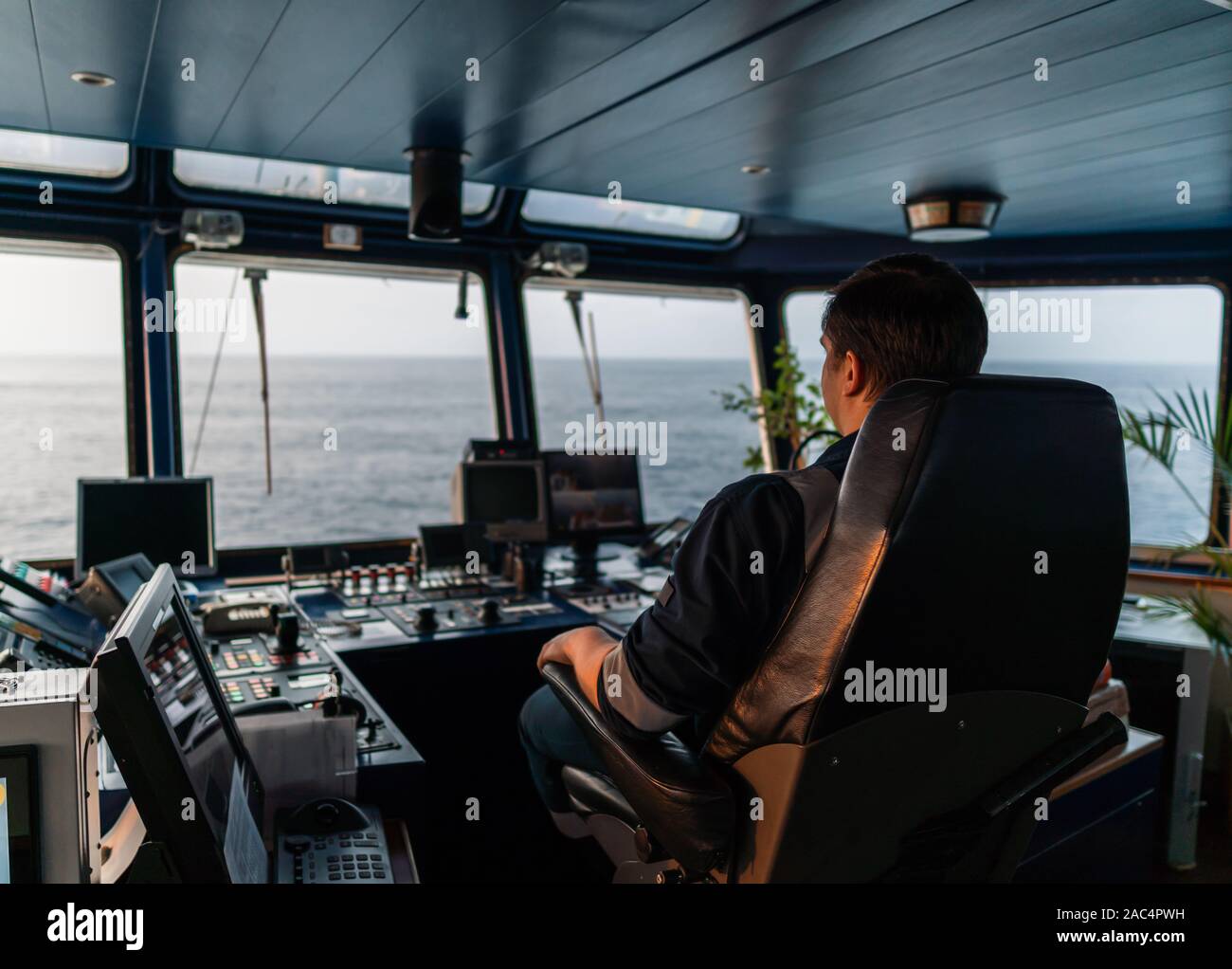 Marine navigational officer during navigational watch on Bridge . Work ...
