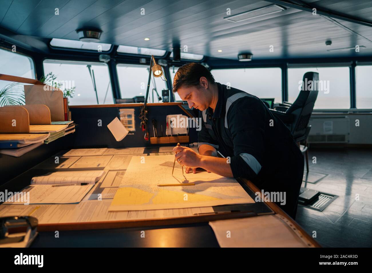 Marine navigational officer during navigational watch on Bridge Stock ...