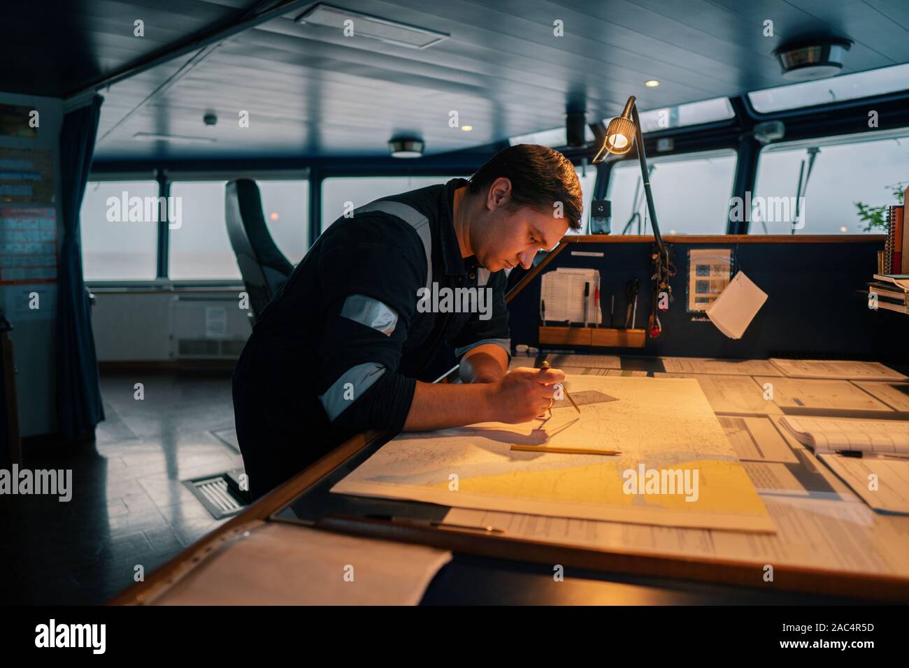 Marine navigational officer during navigational watch on Bridge Stock ...