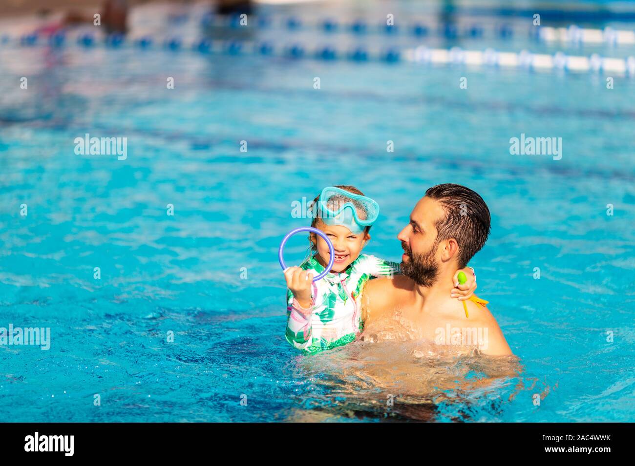 Family swimming pool holidays hi-res stock photography and images - Alamy
