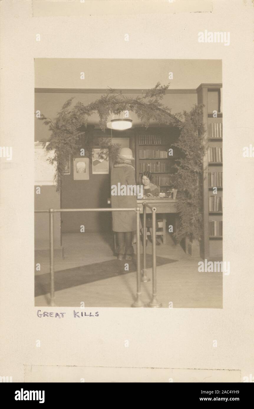 Great Kills, Librarian and patron at desk Great Kills, Librarian and ...
