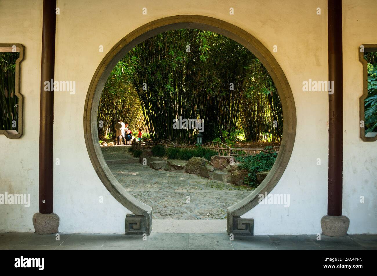 Circular archway with bamboo behind it in the Guyi Garden, Shanghai ...