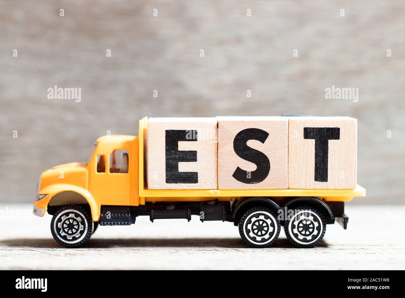 Truck hold letter block in word est (abbreviation of established ...