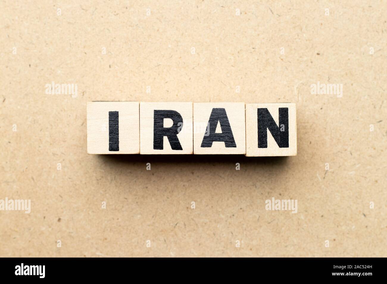 Letter block in word Iran on wood background Stock Photo - Alamy