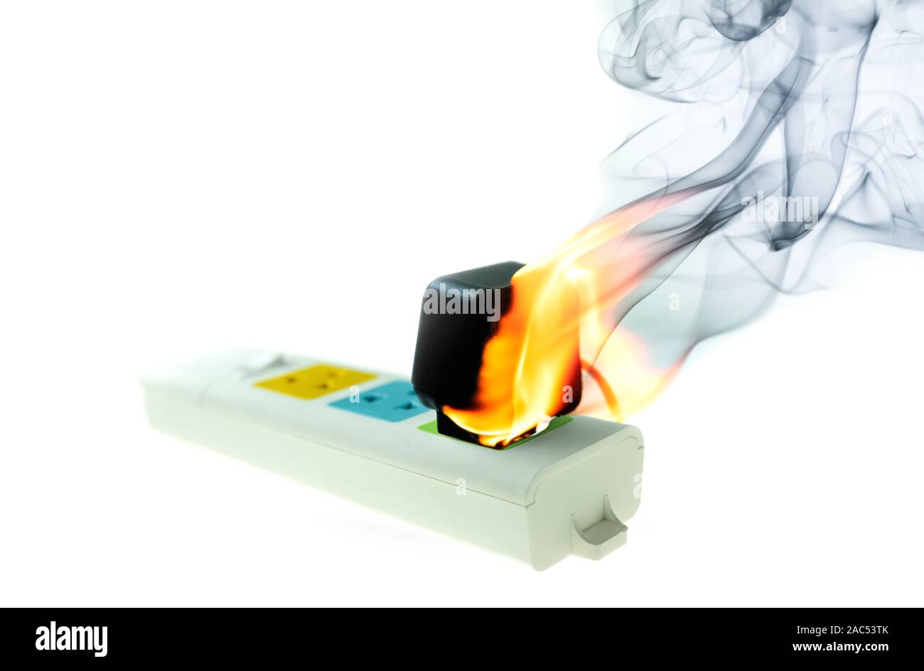 The fire is burning adapter plug receptacle at white background ...