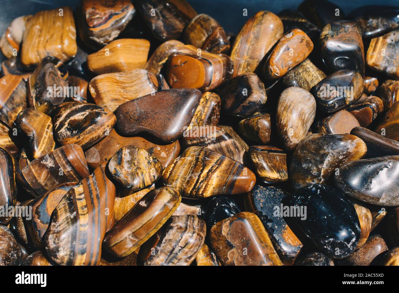 tiger's eye and hawk's eye gemstone as natural mineral rock specimen ...