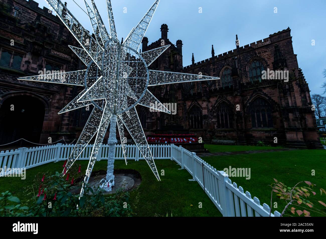 An illuminated Christmas decoration in the shape of a star in the ...