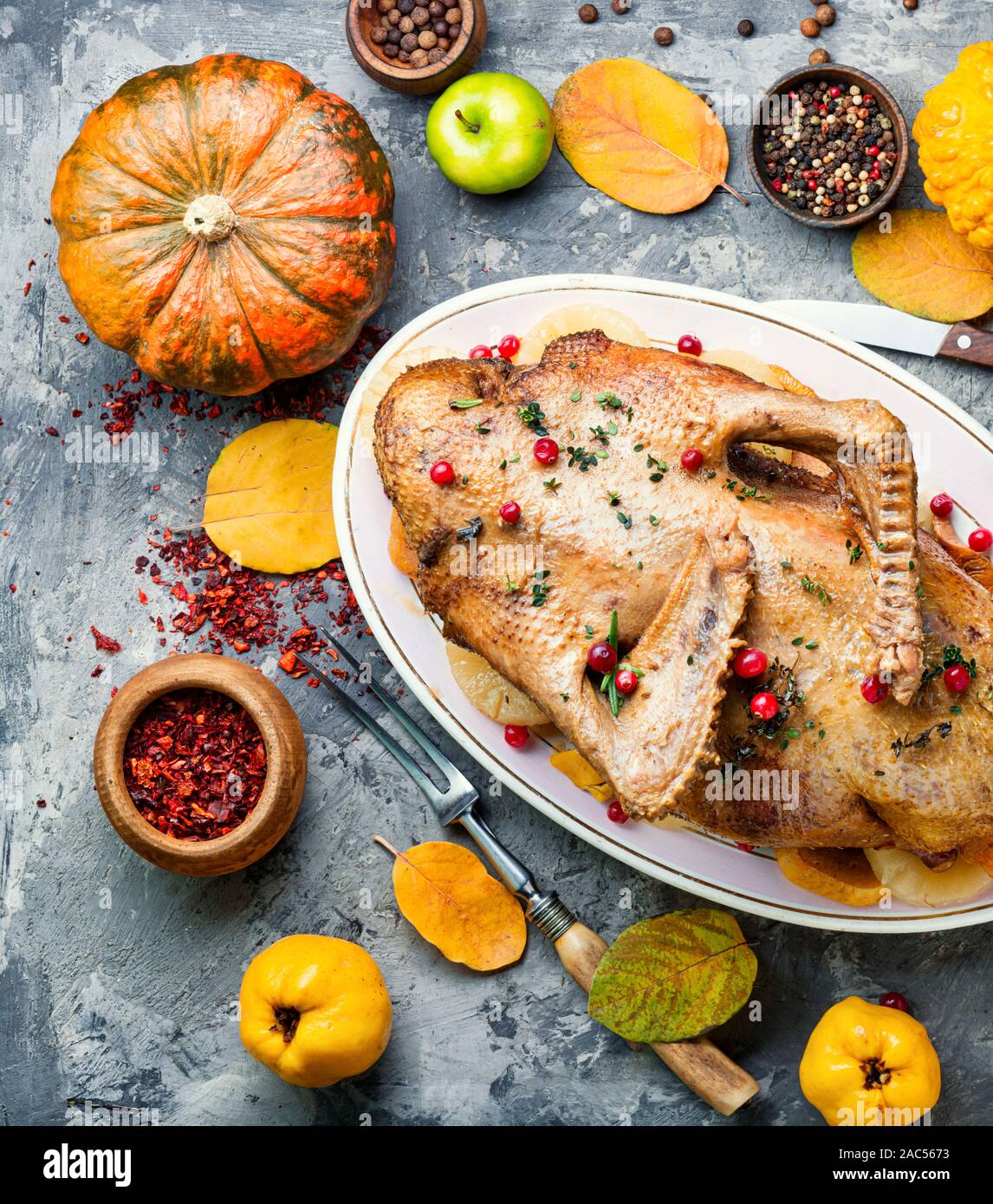 Baked whole duck with pineapple and quince.Flat lay Stock Photo - Alamy