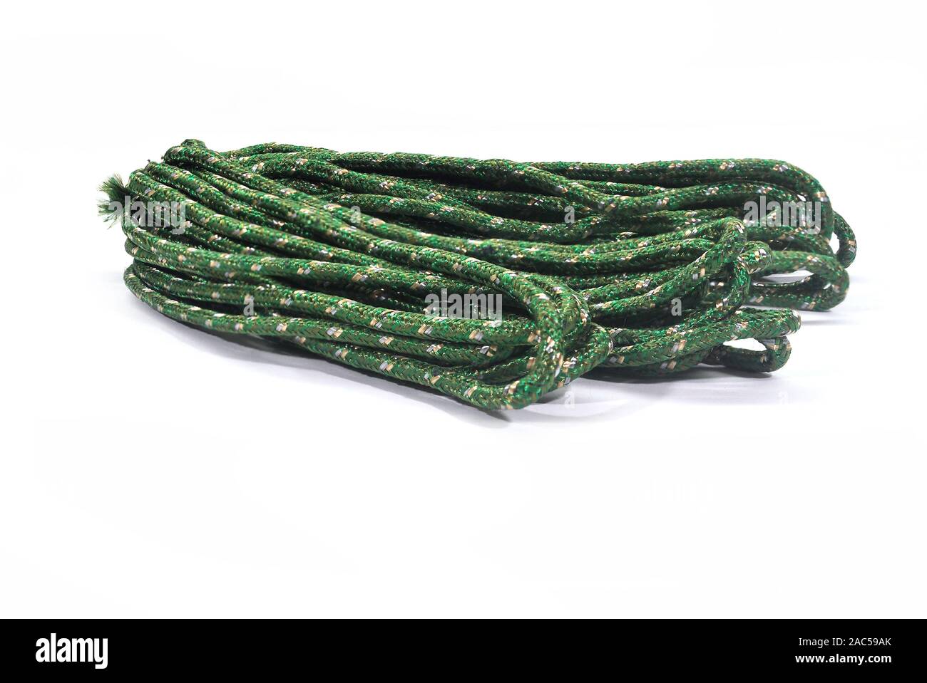 Green nylon rope on a white background Stock Photo - Alamy