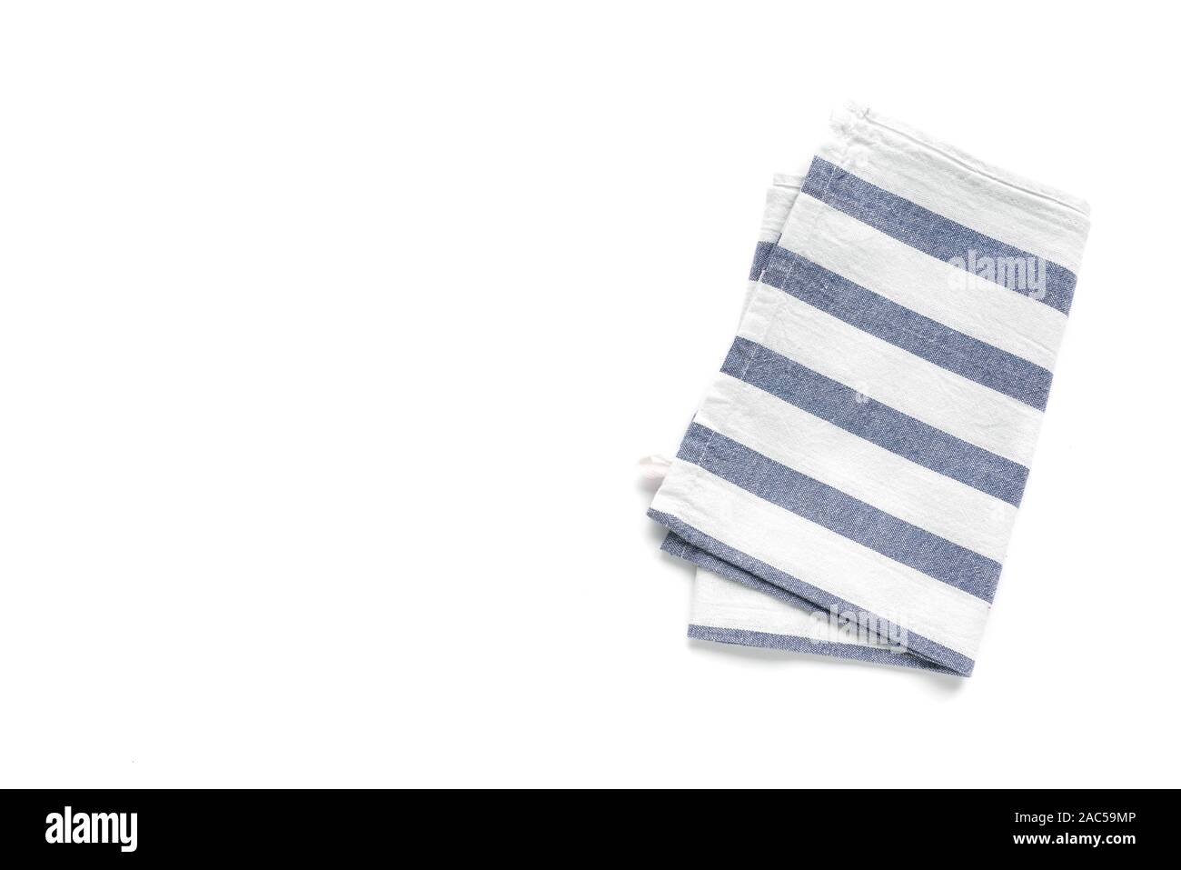 Blue cloth kitchen napkin, linen tablecloth isolated on white ...