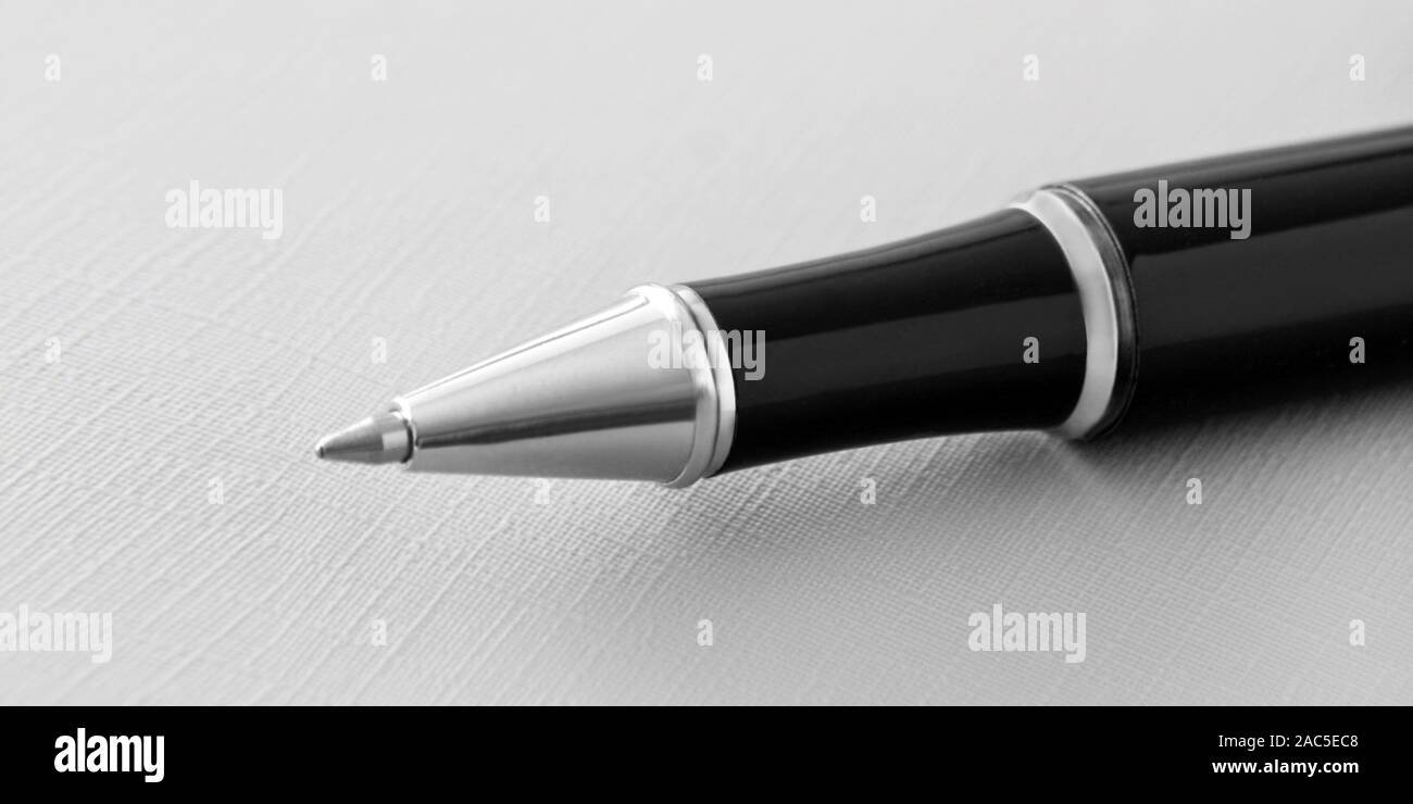 Ball pen close up on grey background Stock Photo - Alamy