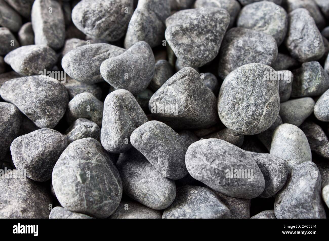 Natural grey stones decoration supplies Stock Photo - Alamy
