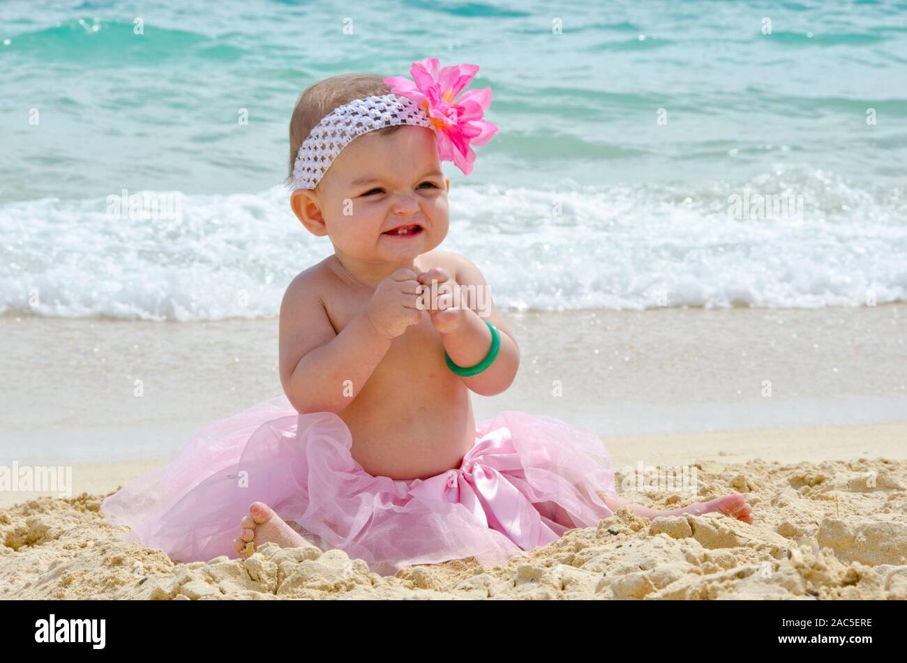 Local baby Emma in her pink tutu on the beach Stock Photo - Alamy