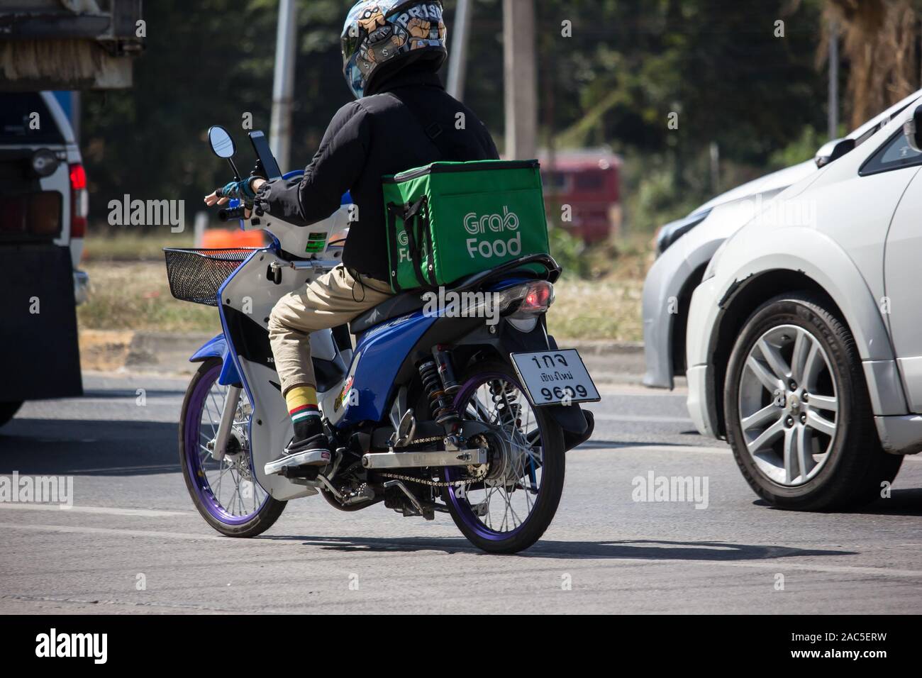 Chiangmai, Thailand - November 21 2019: Delivery service man ride a ...