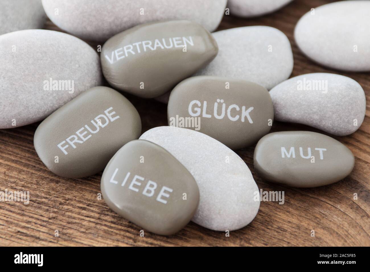 Stones and German: Joy, Love, Bravery and Faith Stock Photo - Alamy