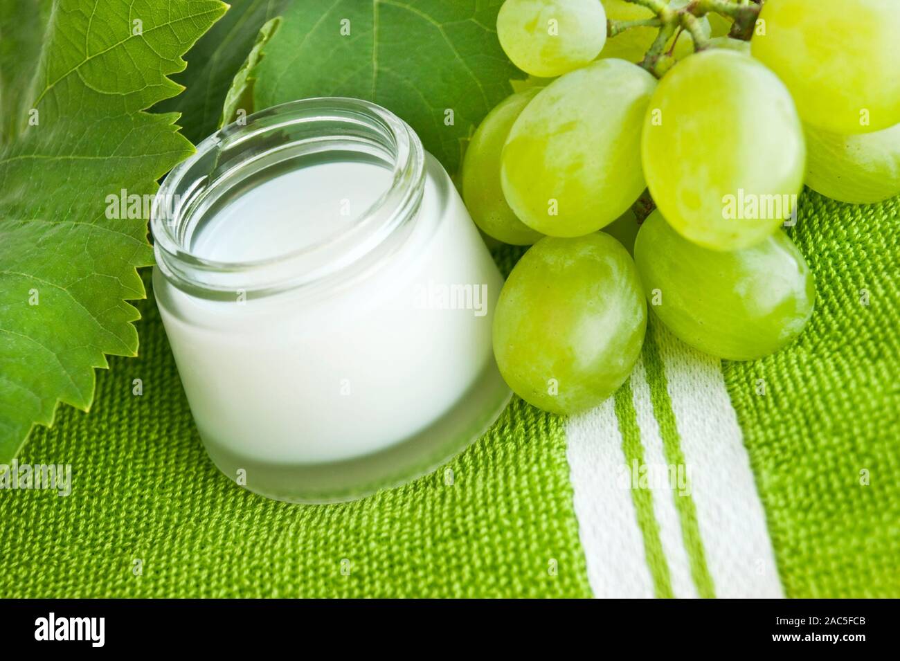 Grape oil green grapes leaves hi-res stock photography and images - Alamy