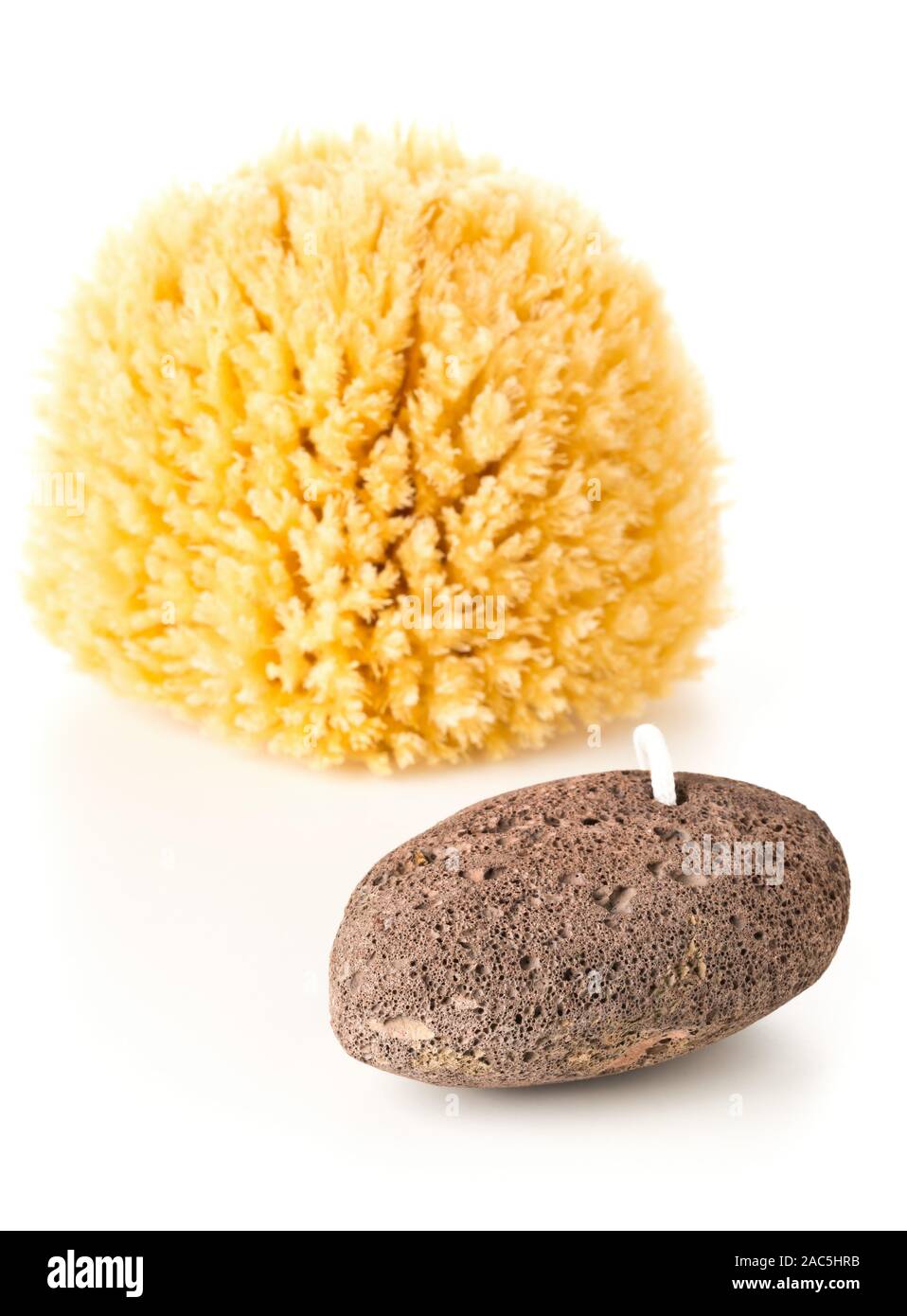 Black lava pumice stone and natural sponge spa or bath utensil used for ...