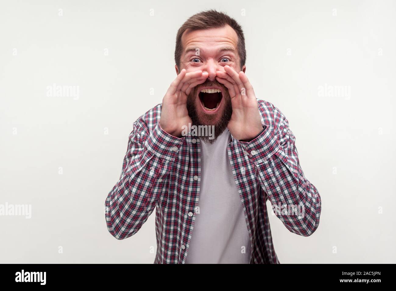 Shouting mouth open holding aggression hi-res stock photography and ...