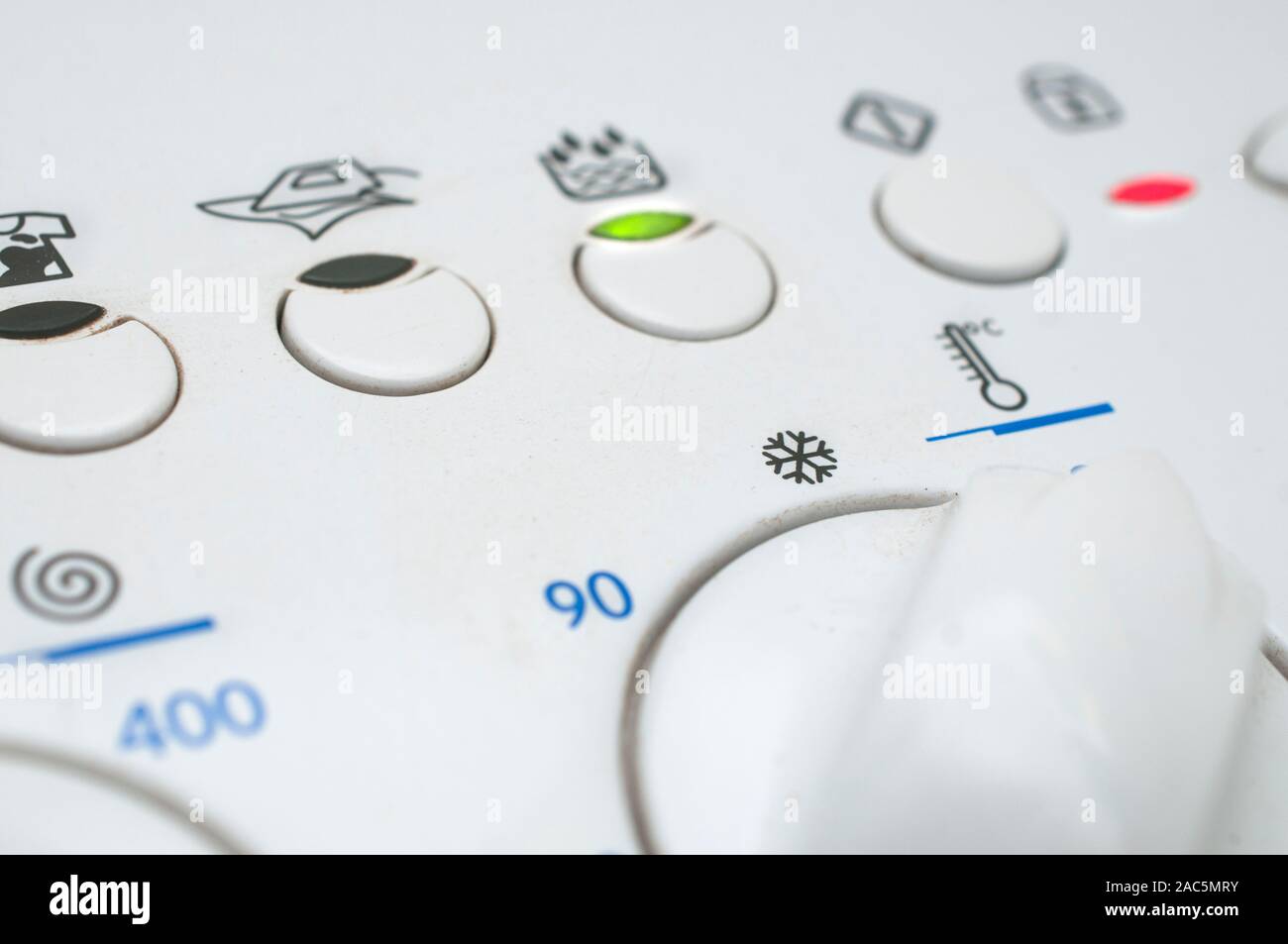 Cold wash program selector on a washing machine, shallow depth of field ...