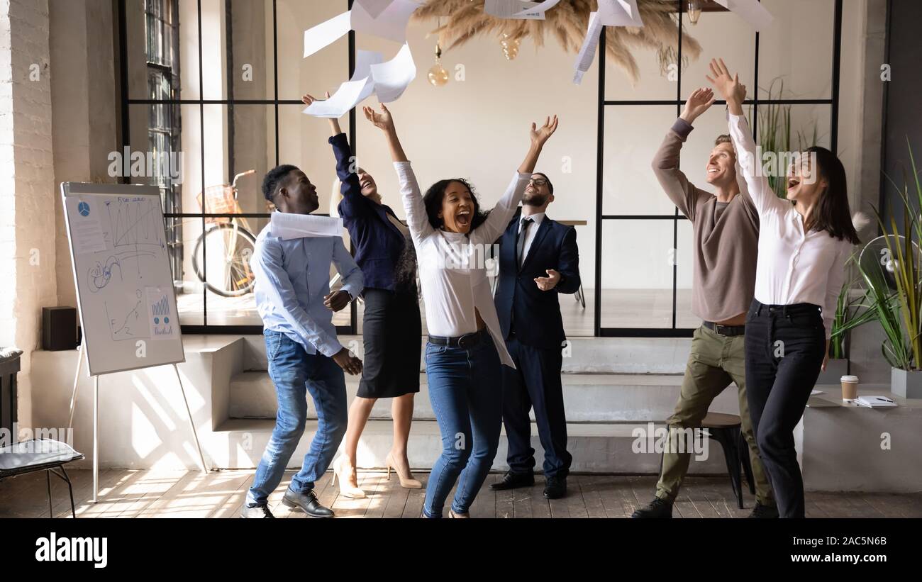 Happy african american young employee enjoying friday party with ...