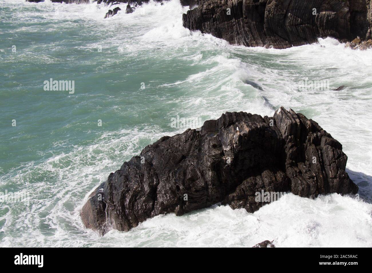 The view of marine landscape with rock and sea waves Stock Photo - Alamy