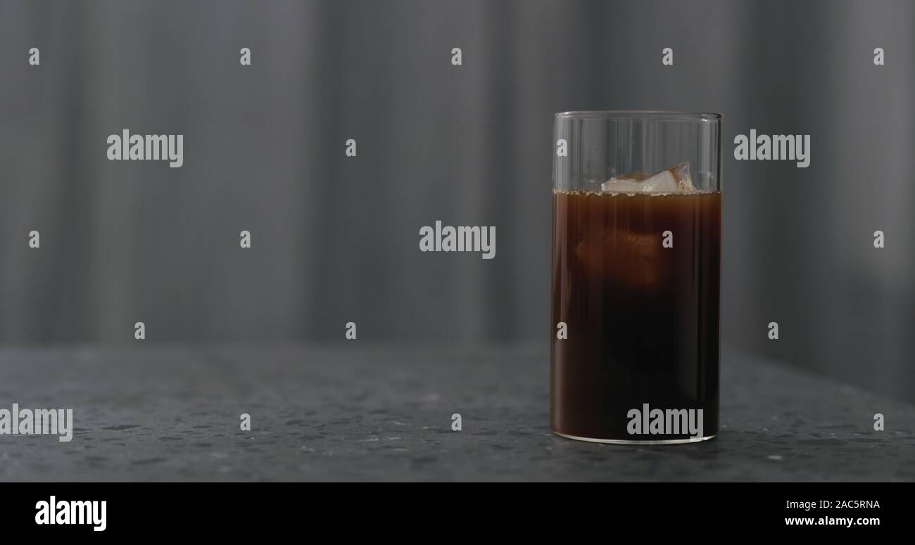 iced coffee in glass on terrazzo countertop, wide photo Stock Photo - Alamy
