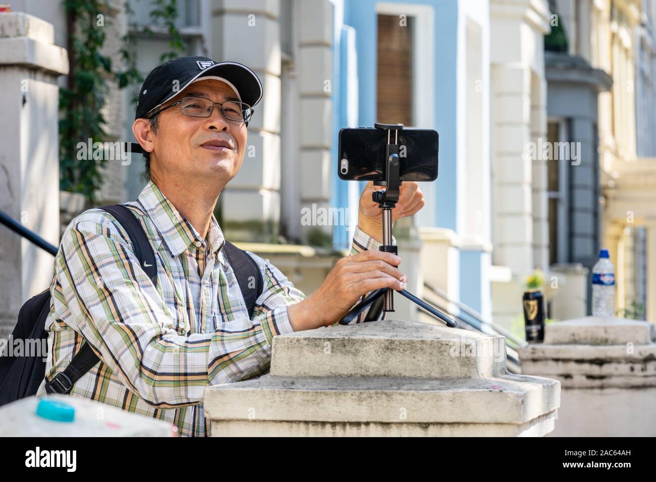 Digital lifestyle filming smart phone hi-res stock photography and ...