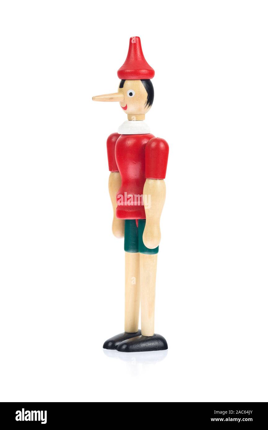 Wooden Pinocchio doll cutout Stock Photo - Alamy